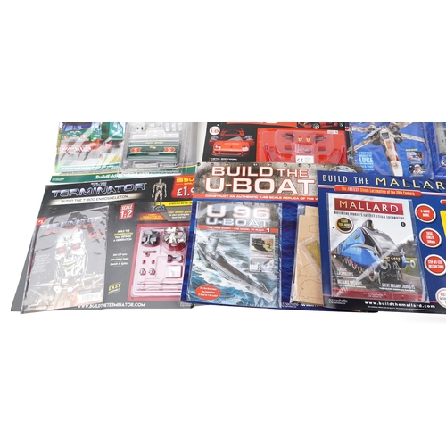 A collection of collectable magazines, predominantly model kits.