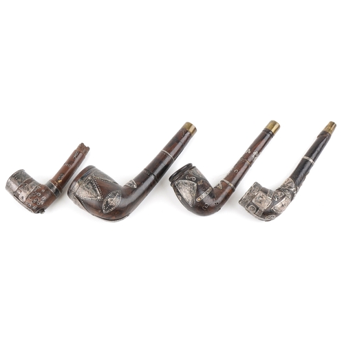 Four silver inlaid burr wood tobacco smoking pipes, 13.5cm in length.
