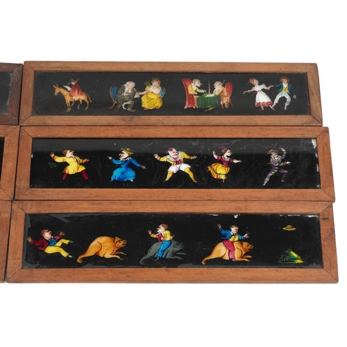 A collection of 19th century coloured magic lantern slides, each housed ...