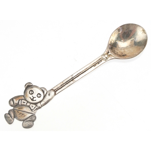 Tiffany & Co., a sterling silver nursery spoon in the form of a teddy ...