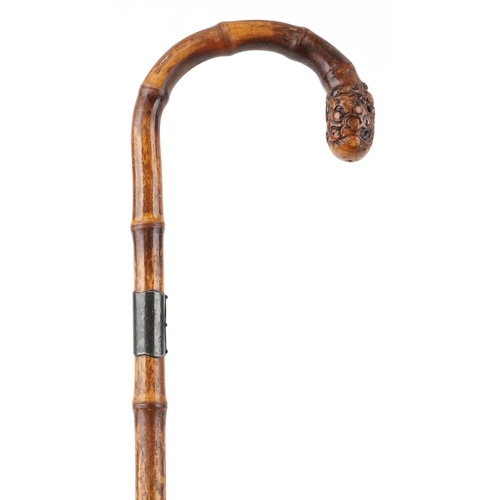 A 19th century bamboo walking stick with burr handle and silver collar ...