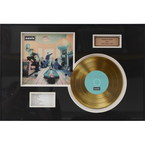An Oasis 'Definitely Maybe' gold disc display, framed and glazed ...