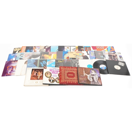 A small group of vinyl LP records including Tubular Bells by Mike ...