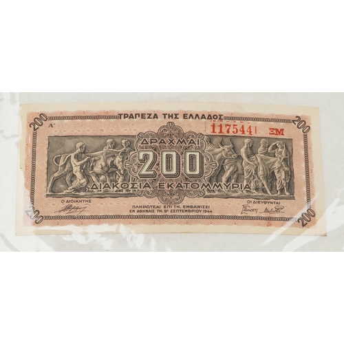 A small selection of vintage banknotes including a British George V ...