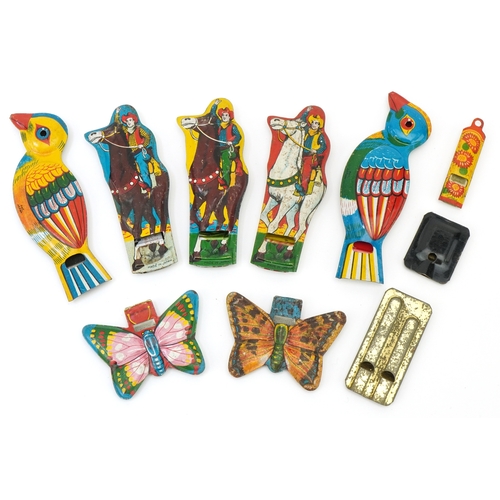 Ten 1960s tinplate whistles of various forms including birds, horses ...