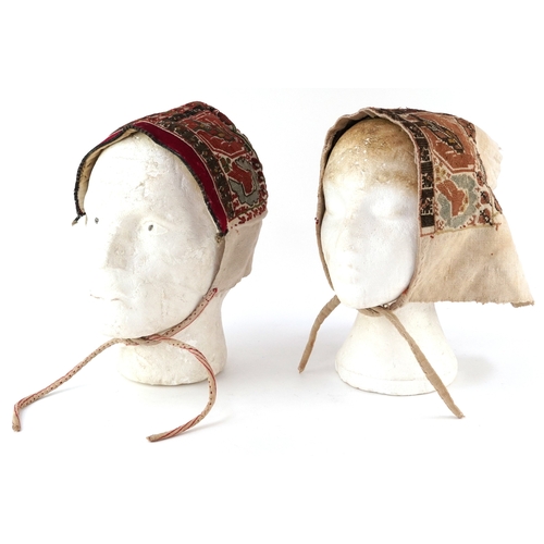 Two 18th century Middle Eastern embroidered head scarves, the largest ...
