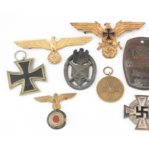 A collection of German military interest badges and medals.