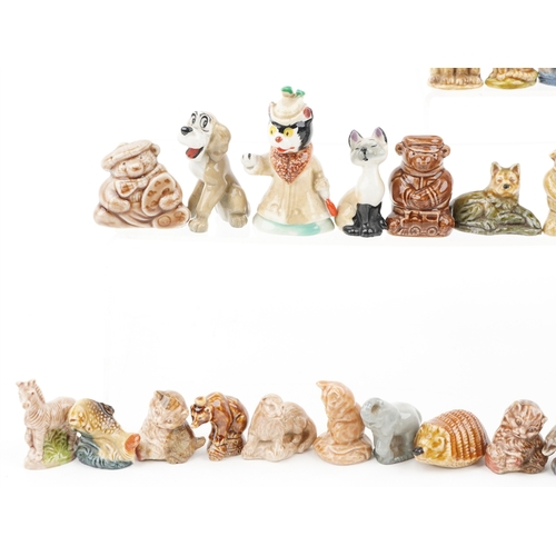 A collection of Wade Whimsies figures including Disney figures, the ...