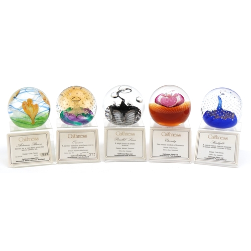 Five Caithness glass paperweights with certificates and stands ...