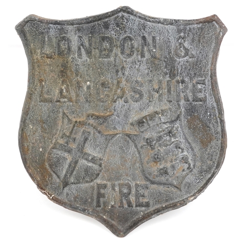 An 18th century London & Lancashire shield shaped lead fire mark, 20cm ...