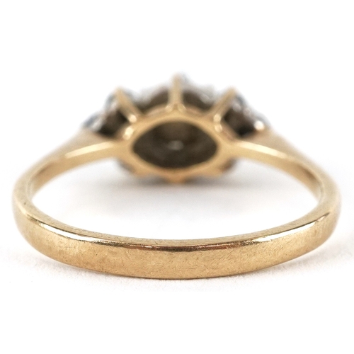 A 9ct gold blue spinel and clear stone cluster ring, size O, 2.5g.