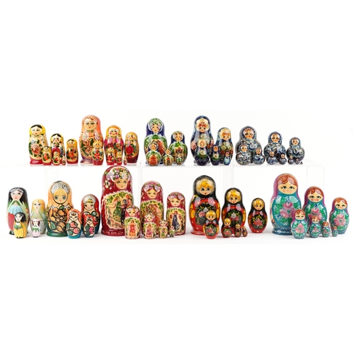 Ten sets of Russian Matryoshka hand painted stacking dolls, the largest ...
