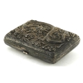 A Chinese export unmarked silver cigarette case profusely embossed with ...