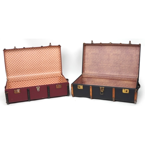 Two early 20th century wood bound travelling trunks, one finished in ...