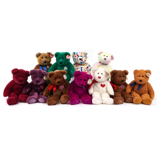 A collection of large TY Beanie Babies bears, various designs.
