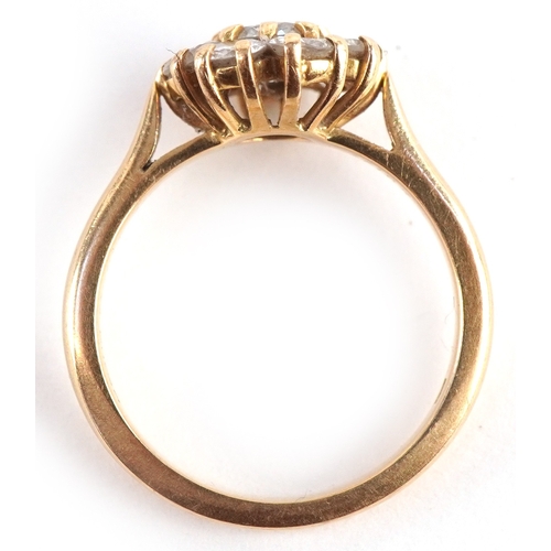 A Cartier 18ct gold diamond cluster ring, the largest diamond ...