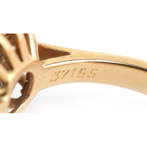 A Cartier 18ct gold diamond cluster ring, the largest diamond ...