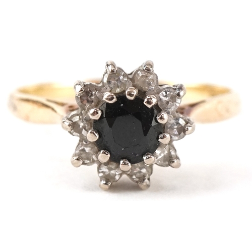 An 18ct gold sapphire and diamond two tier flower head ring, the ...