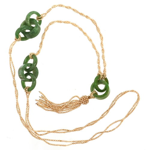 An Art Deco seed pearl and green jade necklace with interlocking rings ...