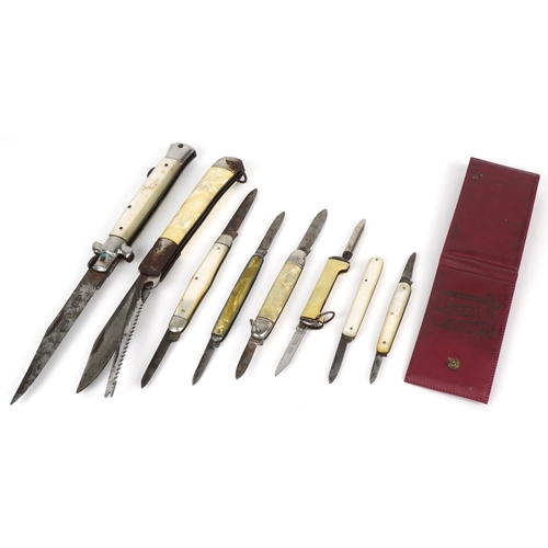 A collection of pocket knives and tools including mother of pearl ...