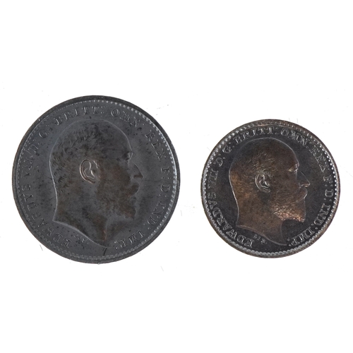 An Edward VII 1905 Maundy money coin set housed in a red presentation box.
