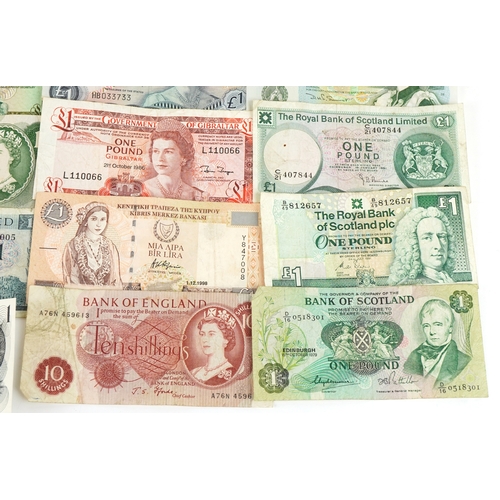 A quantity of vintage British and Commonwealth banknotes including a ...
