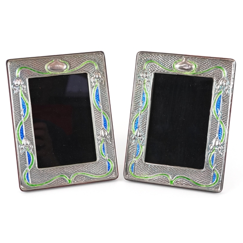 A pair of Art Nouveau style sterling silver and enamel photo frames ...