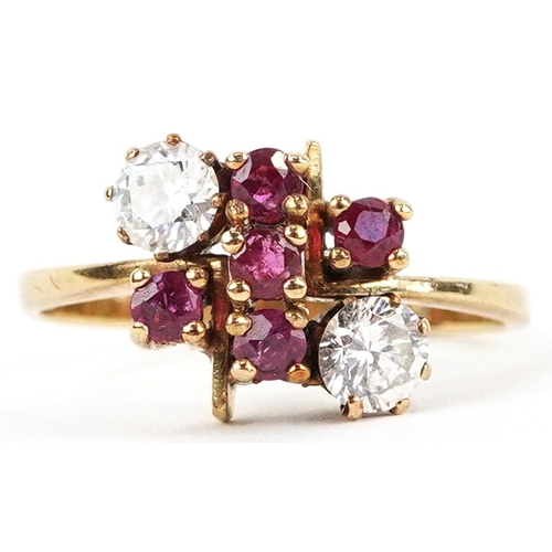 A 9ct gold pink spinel and clear stone cluster ring, size N, 2.7g.