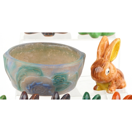 A collection of Bourne Denby Danesby Ware rabbits together with similar ...