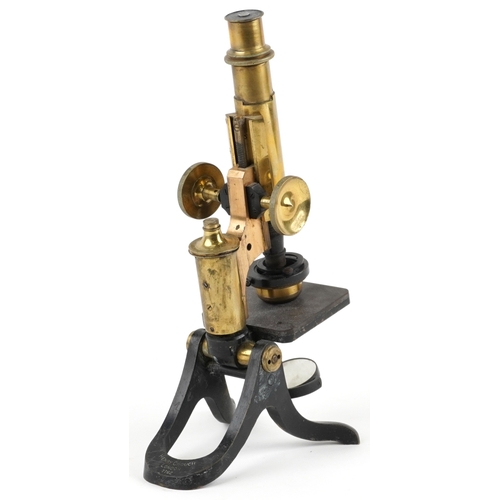 An early 20th century brass and metal monocular microscope by Henry ...