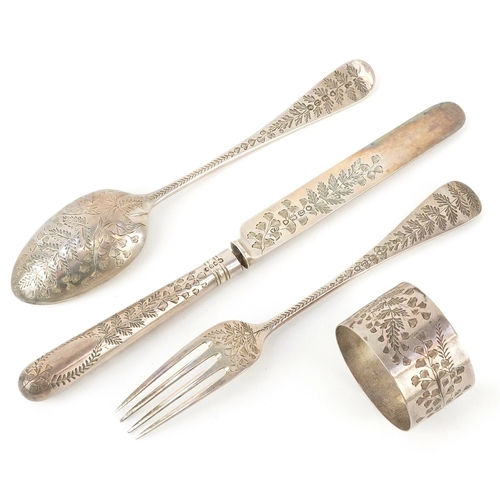 Chawner & Co., a Victorian silver knife, fork, spoon and napkin ring ...