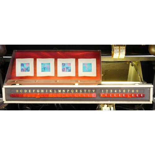 Rowe AMI MM1 jukebox, serial number 730431, with a selection of singles ...