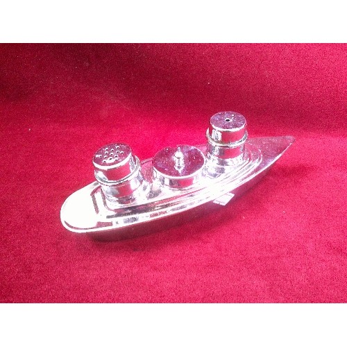 ATTRACTIVE CHROME-PLATED CONDIMENT SET. IN THE STYLE OF A SHIP. THE ...