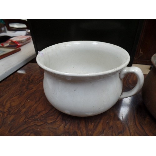 AN UNUSUAL COPPER CHAMBER POT AND A WHITE CERAMIC CHAMBER POT
