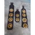 THREE LEATHER DISPLAY STRAPS WITH THREE TYPES OF ANTIQUE BEEHIVE BRIDLE ...