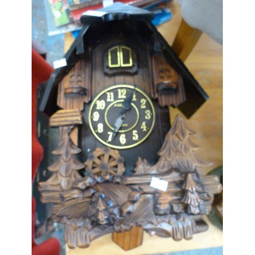 LARGE ACCTIM CUCKOO CLOCK. ROOF REQUIRES RE-STICKING.