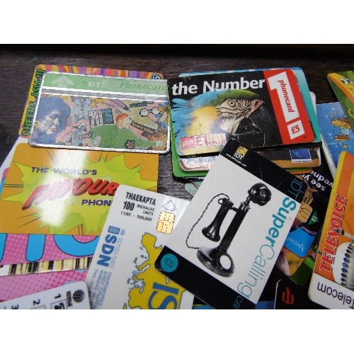 BOX FULL OF VINTAGE PHONE CARDS. BT, UNI-TEL, CHEERS ASIA, GO BANANAS ...