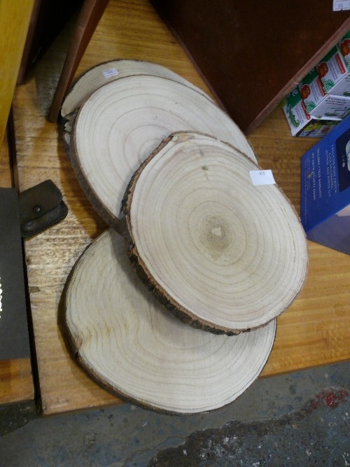 FOUR LARGE WOODEN LOG SLICES, NEW FROM HOBBYCRAFT.