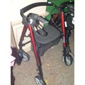 MOBILITY WALKER WITH SEAT AND BRAKES BY NRS HEALTHCARE.