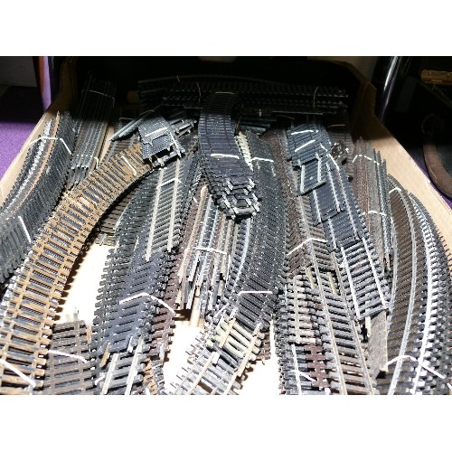 A BOX OF OO GAUGE TRAIN TRACK.