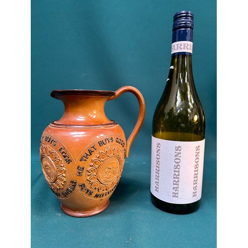 19th Century Doulton Lambeth stoneware motto pub jug. "He that buys ...