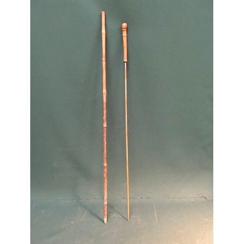 An antique bamboo sword stick cane with blade length 58cm. Cleverly ...