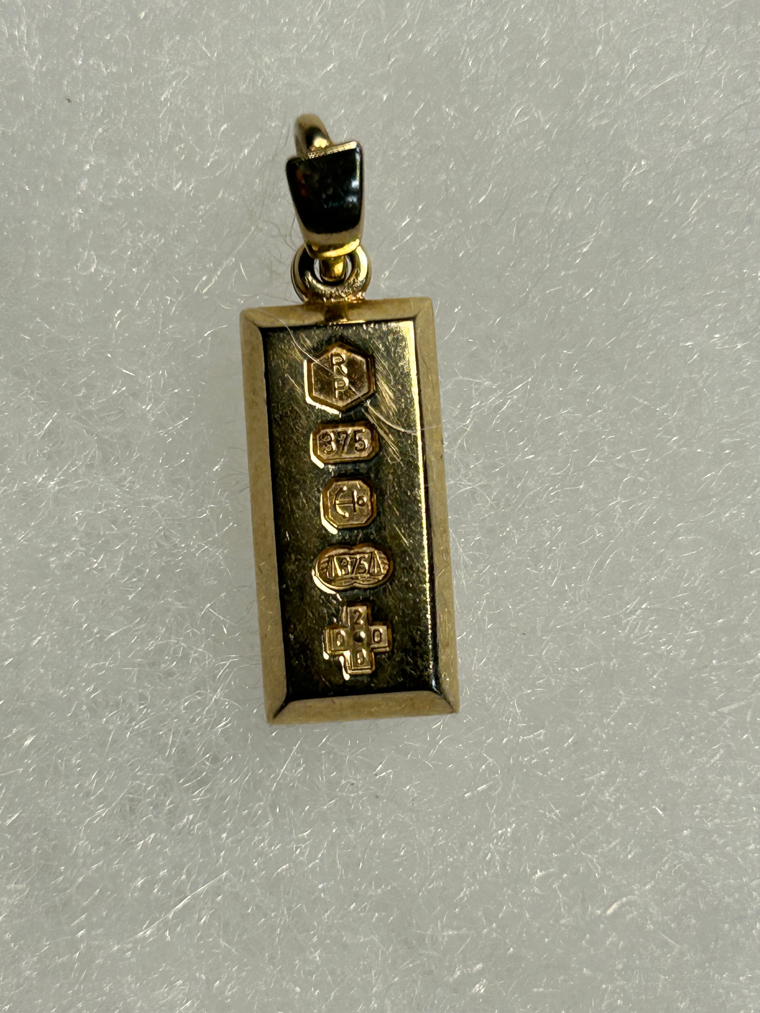 A 9ct Gold bar - millenium hallmark, engraved to the back. 3.5 grams