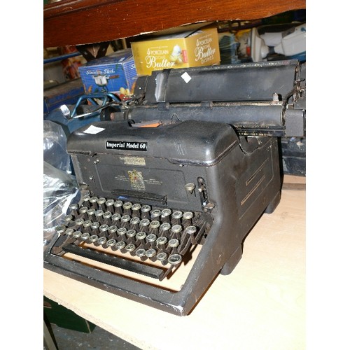 A VINTAGE IMPERIAL MODEL 60 TYPEWRITER