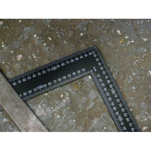 A LARGE SET SQUARE INCLUDING 2 X 1M RULES AND AN ENGINEERS TRUE