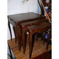 A NEST OF 3 ORNATE TABLES IN GOOD CONDITION WITH VERY GOOD QUARTERED VENEER