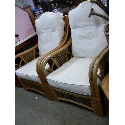 PAIR OF CANE CONSERVATORY ARMCHAIRS WITH CREAM CUSHIONS