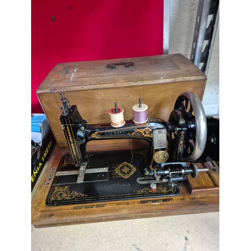 Antique Naumann Sewing Machine (German) in wooden case. A very ...