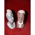 A PAIR OF HEAVY STONE AFRICAN BUSTS