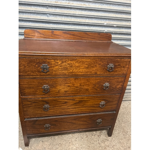 1930’s oak 4 drawer chest with Art Deco style drop handles and upstand